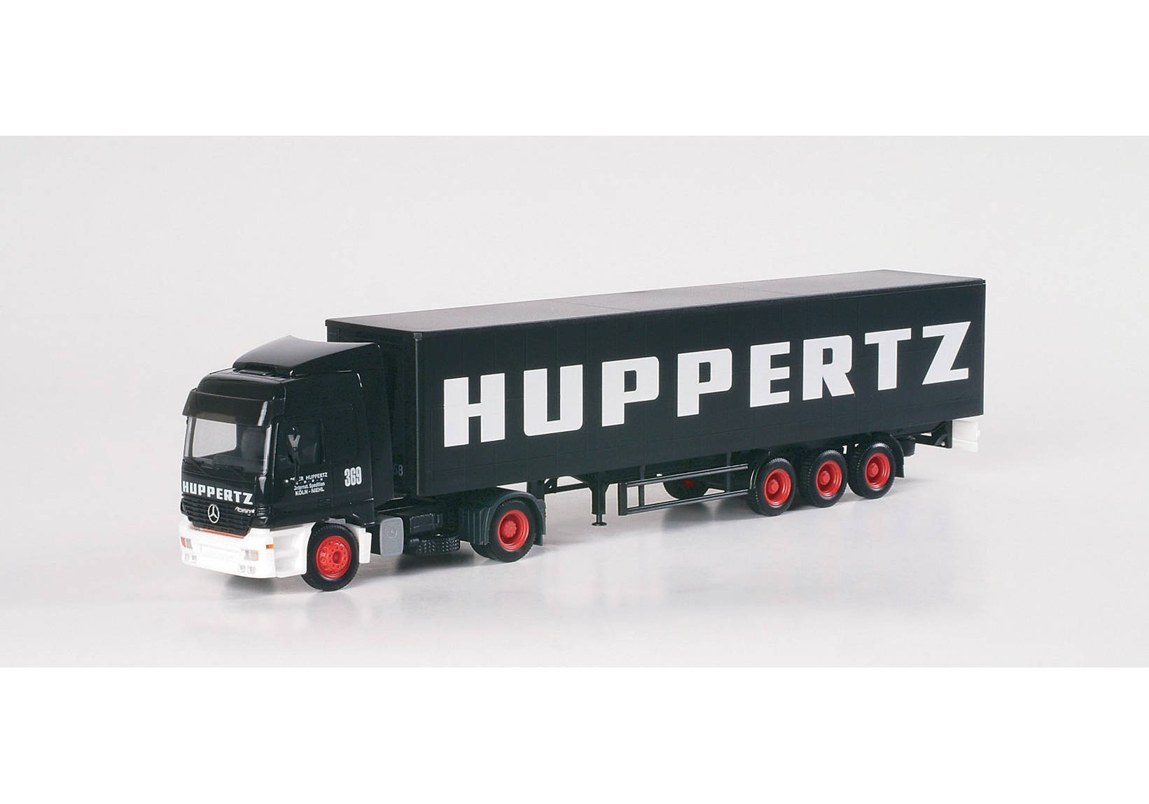 Herpa Mercedes-Benz L Gardinenplanen-Sattelzug "Huppertz" 149914