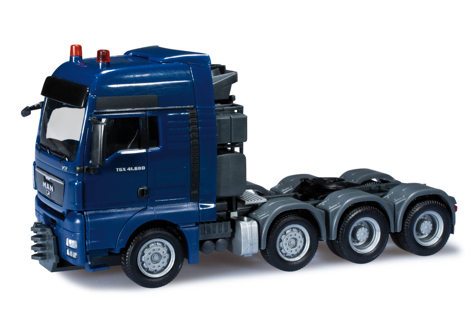 Herpa MAN TGX XXL 680 heavy duty rigid tractor, cobalt blue 154970-003